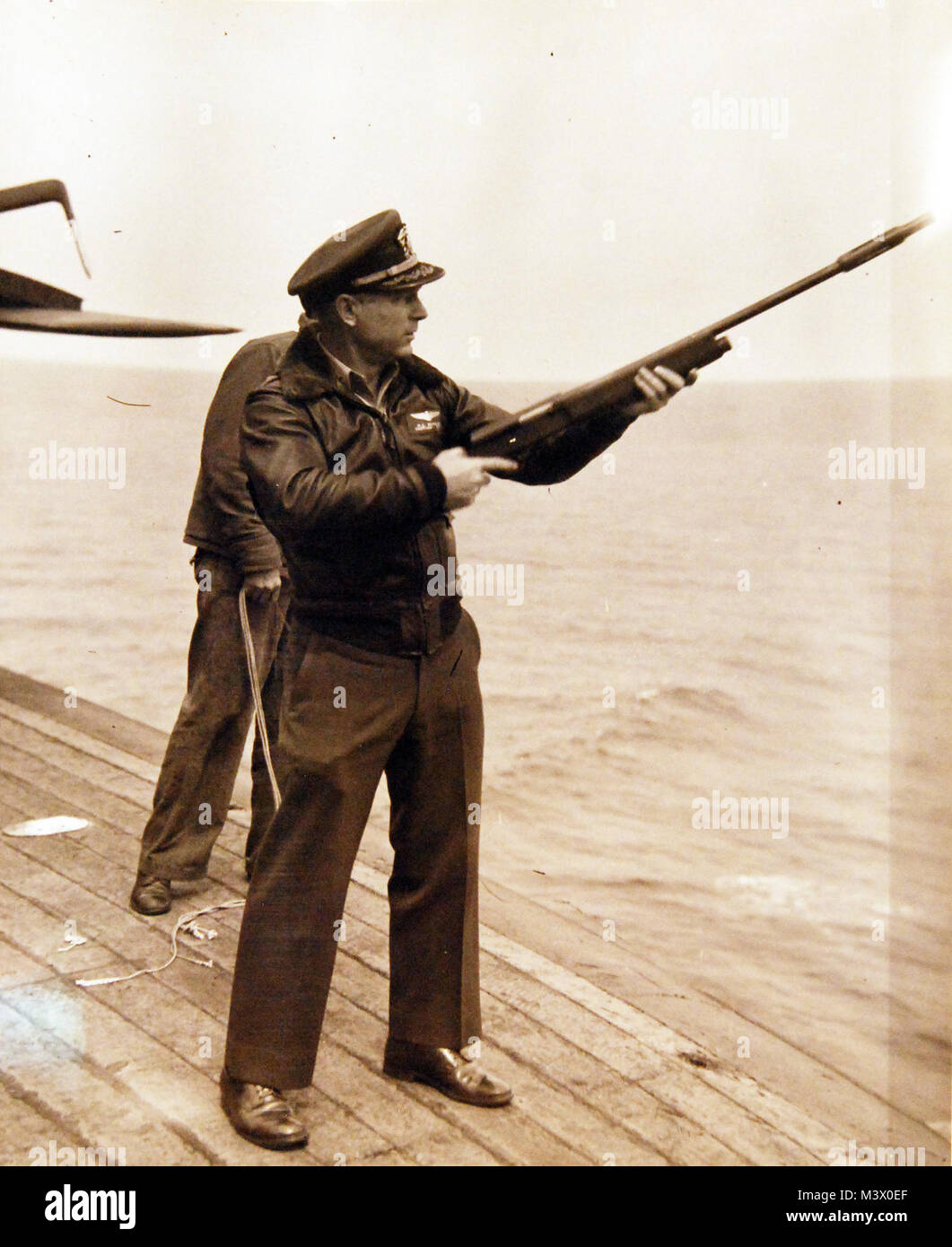 80-G-366322: USS Card (CVE-11), May 1, 1945. Captain Paul L. Dudley ...
