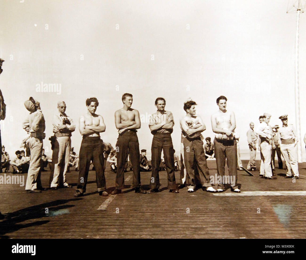 80-G-366343: USS Card (CVE-11), August 10, 1943. German prisoners held ...
