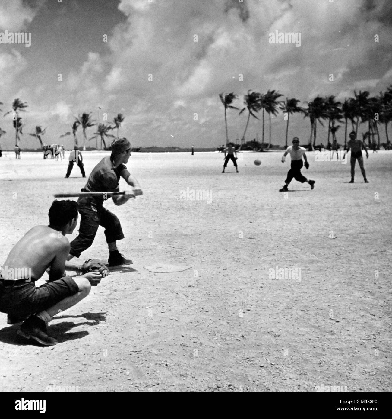 80-G-412961: Mog-Mog Island. Enlisted men enjoy a game of baseball ...