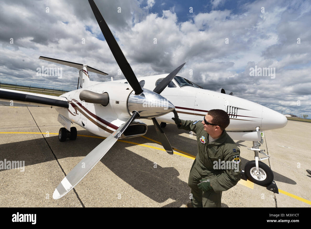 A pilot from the 489th Reconnaissance Squadron performs pre-flight ...