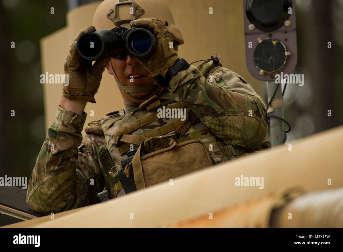 Tech. Sgt. Brian Boisselle conducts long range recon on a possible ...