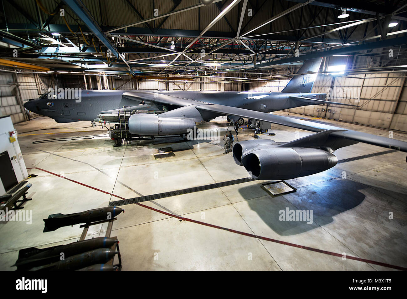 Weapons load crews, assigned to the 5th Aircraft Maintenance Squadron ...