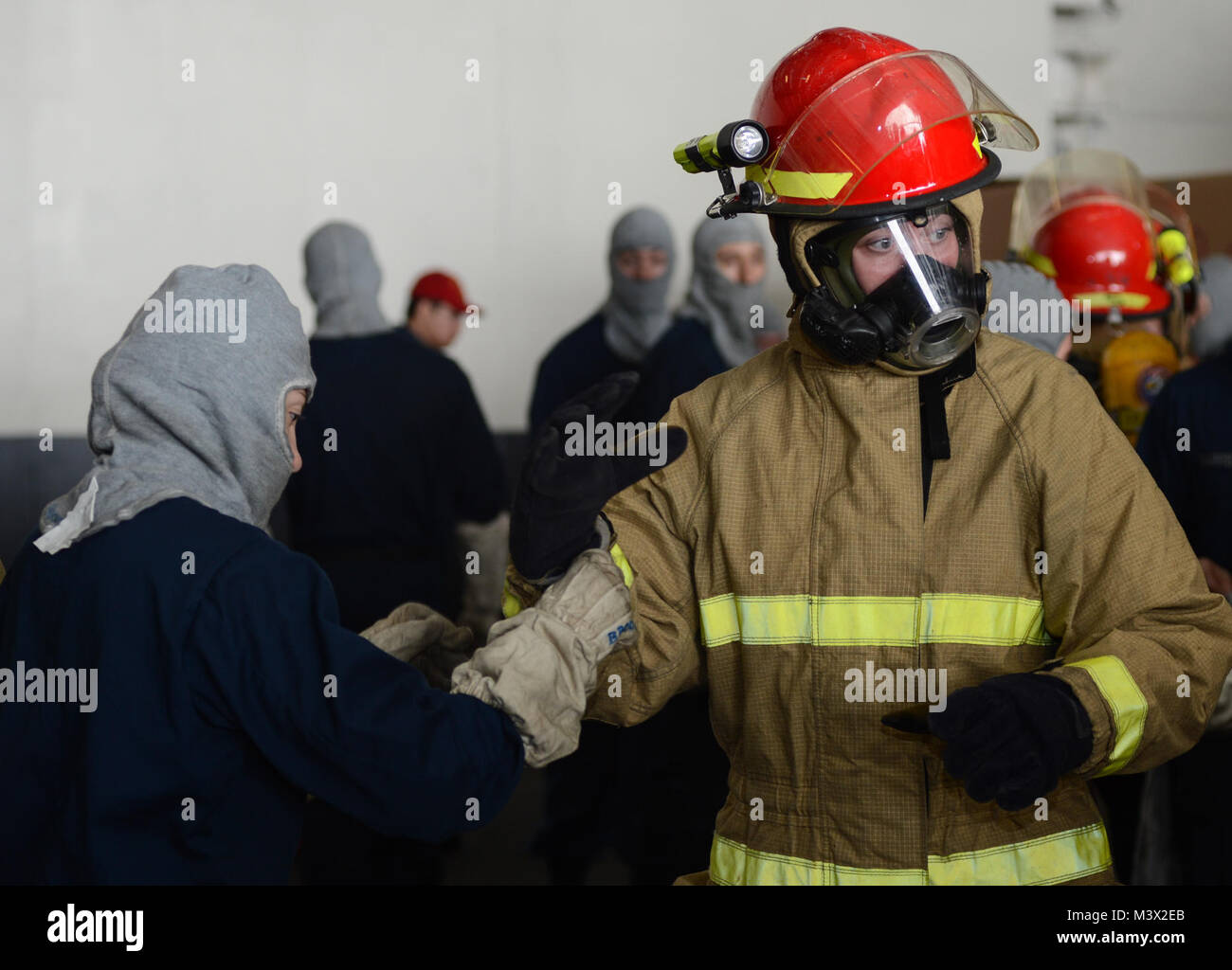 GULF OF OMAN (July 12, 2013) Sailors prepare to participate in a ...