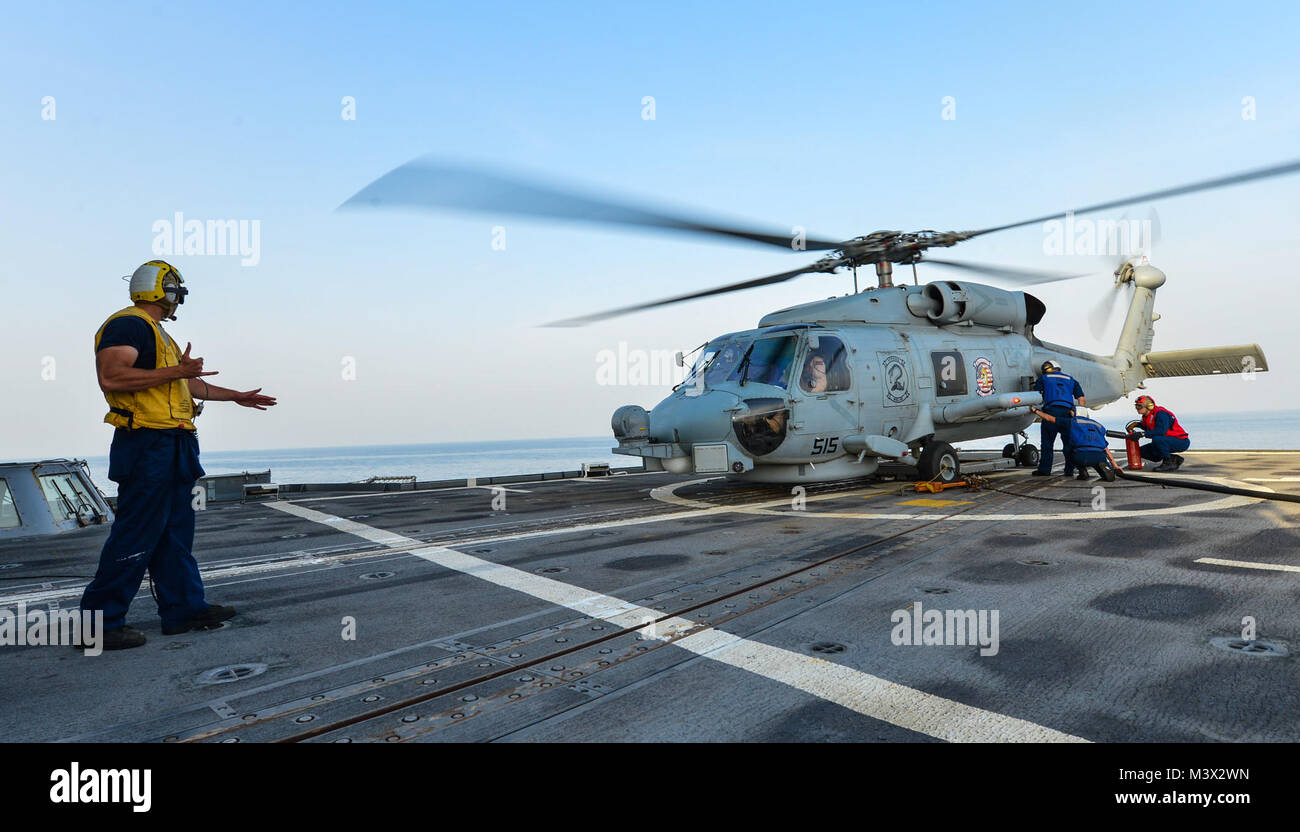 ARABIAN GULF (Aug. 9, 2013) Sailors refuel an SH-60B Sea Hawk ...