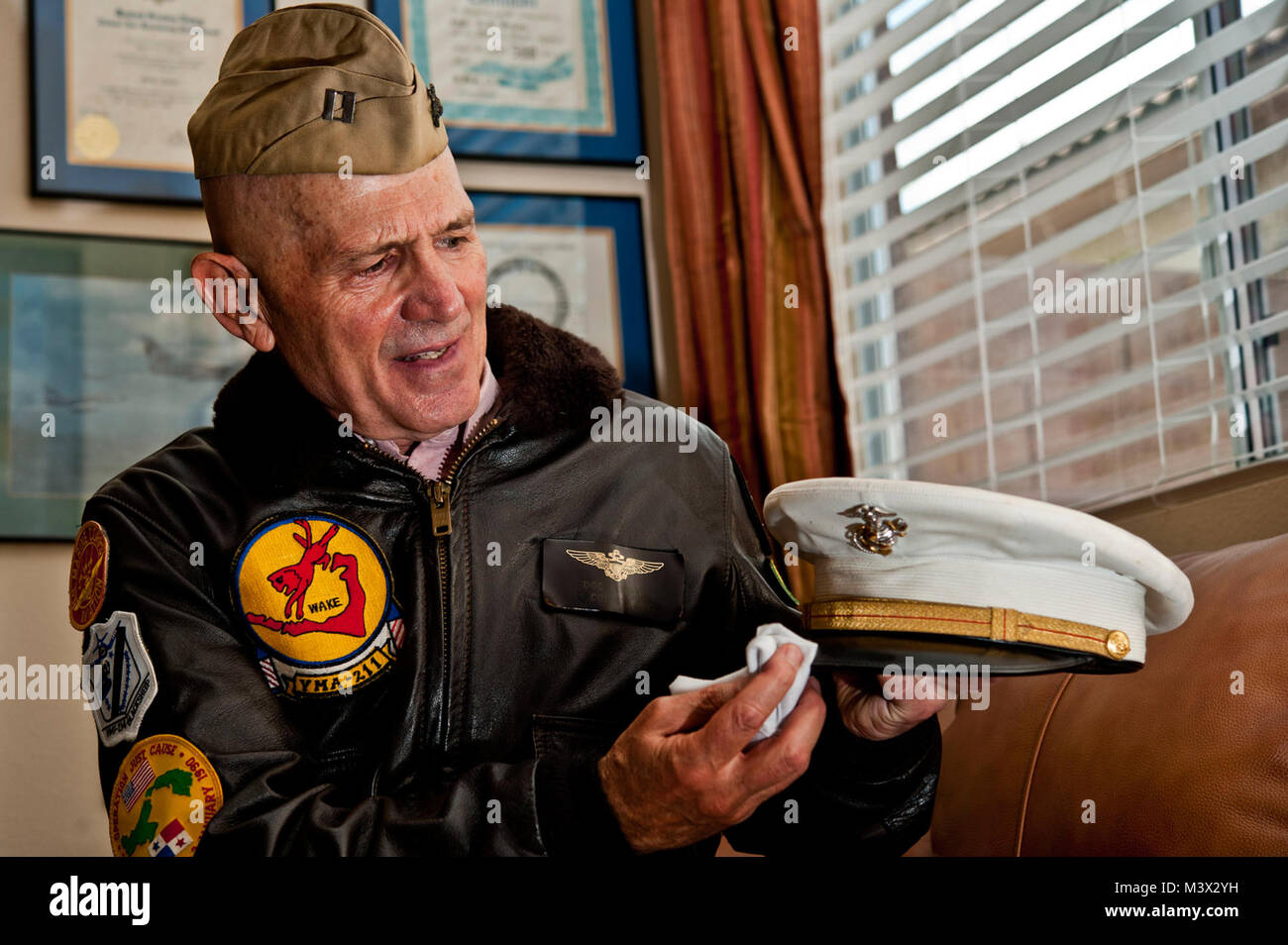 Retired Air Force Col. (Dr.) James Ruffer wipes off his Marine Corps ...