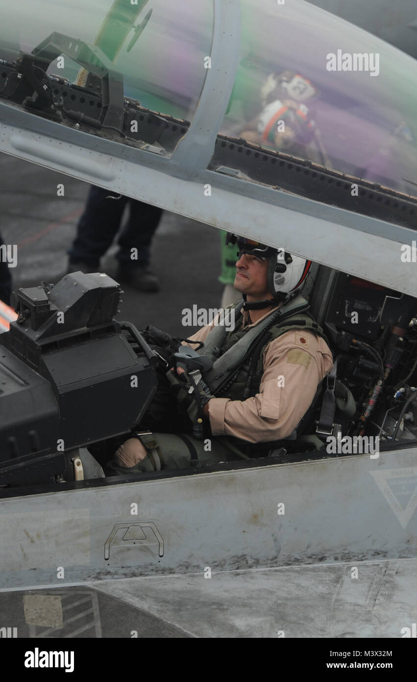 GULF OF OMAN (Aug. 23, 2013) Lt. Cmdr. Jason Cassisi, assigned to the ...