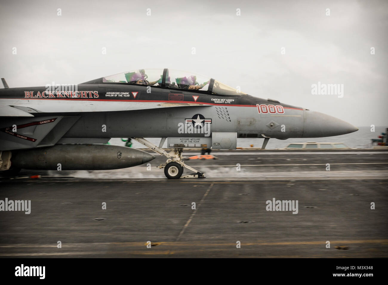 GULF OF OMAN (Aug. 28, 2013) -- Capt. Kevin Mannix, commander, Carrier ...