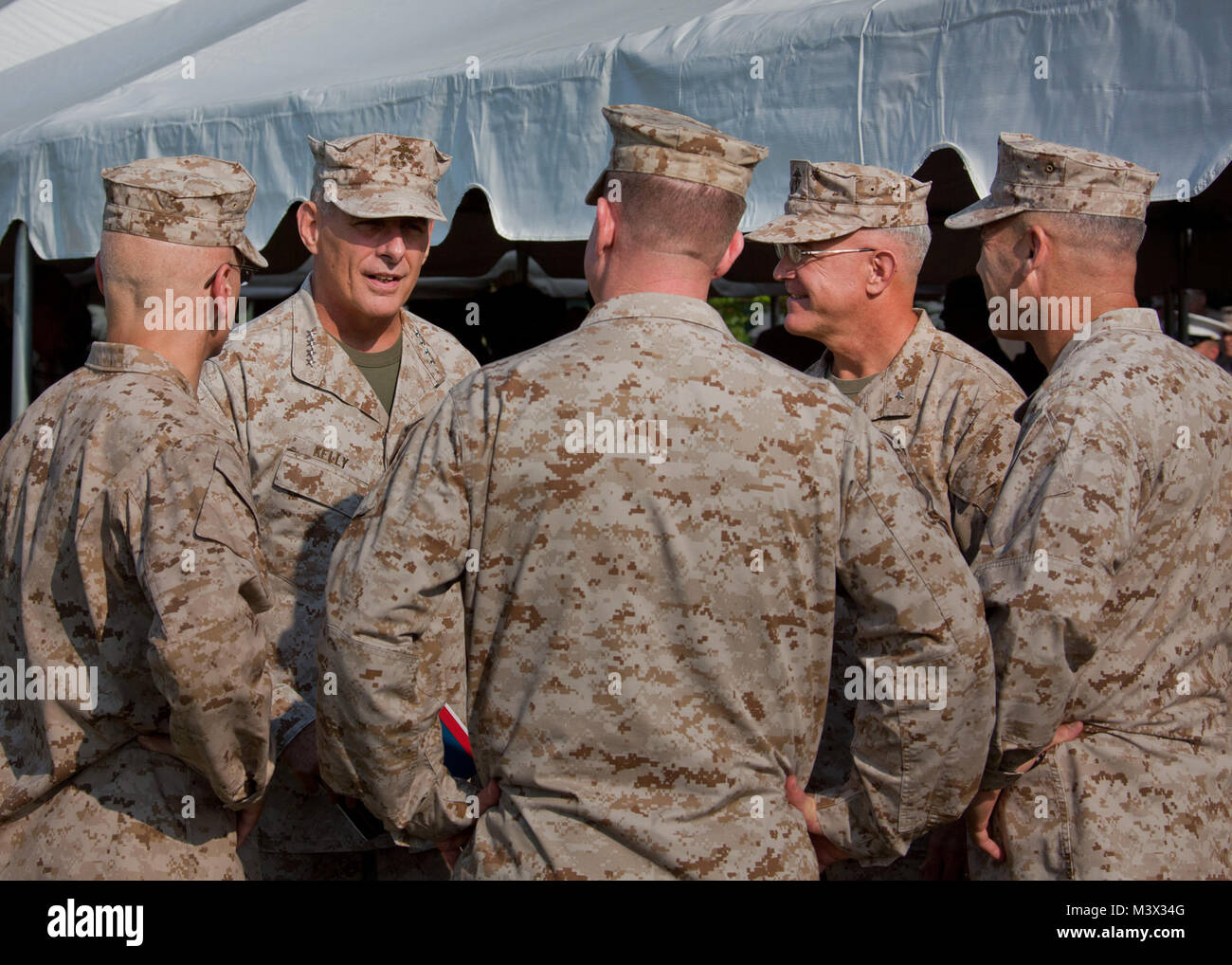 (Left to right) Brig. Gen. Roger R. Machut, commanding general of 4th ...