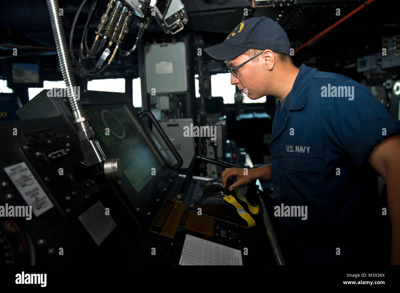 RED SEA (Sept. 4, 2013) Seaman Jacob Geoffroy mans the ship’s control ...