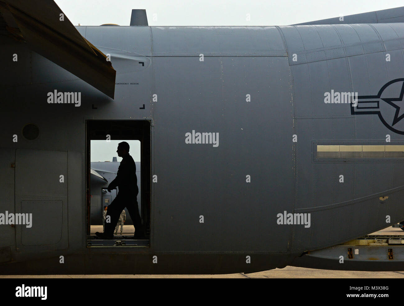 Staff Sgt. Anthony Loverde prepares a C-130J Super Hercules for a cargo ...