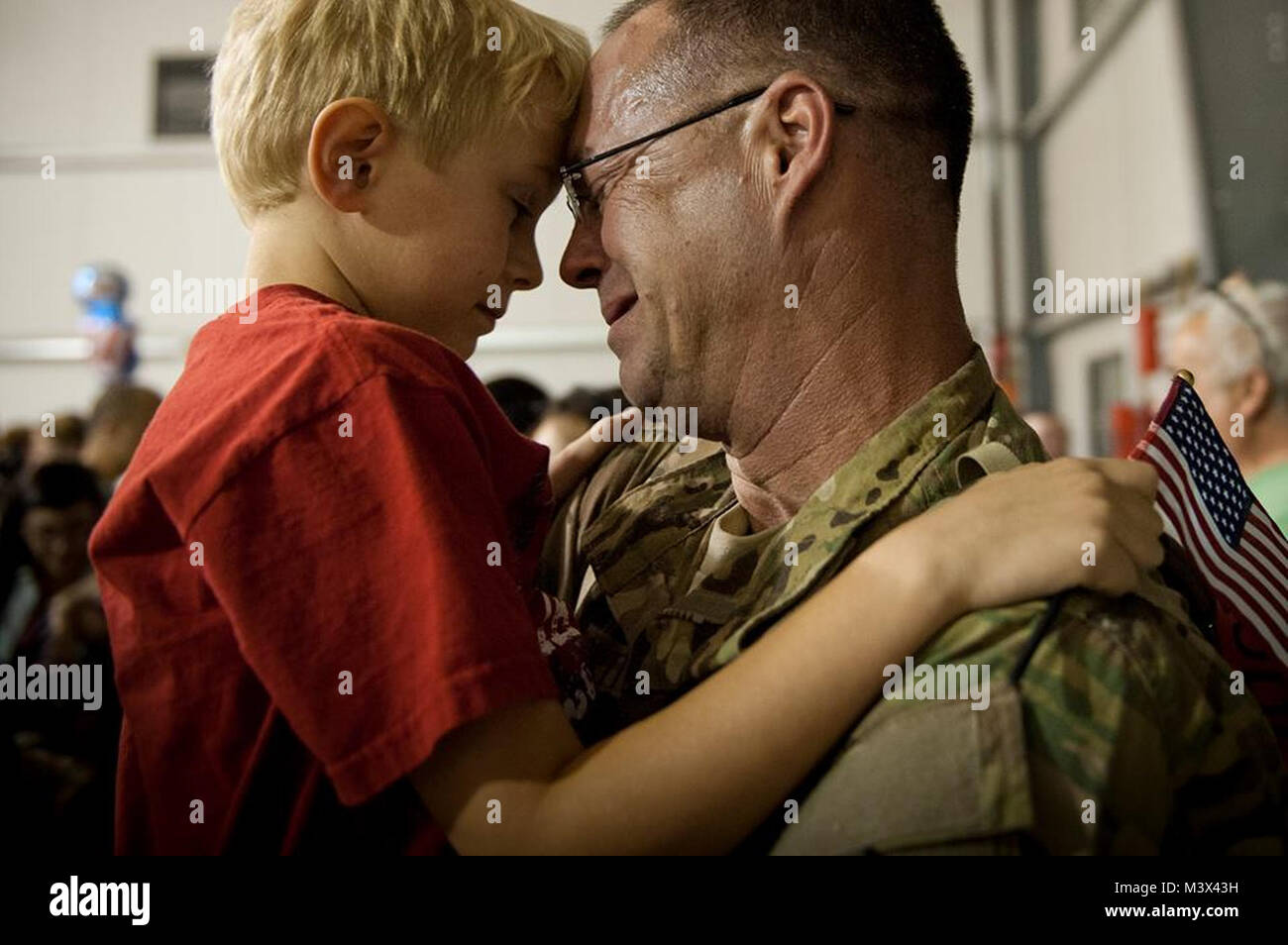 Staff Sgt. Ron Blodgett embraces his son Jack at Nellis Air Force Base ...
