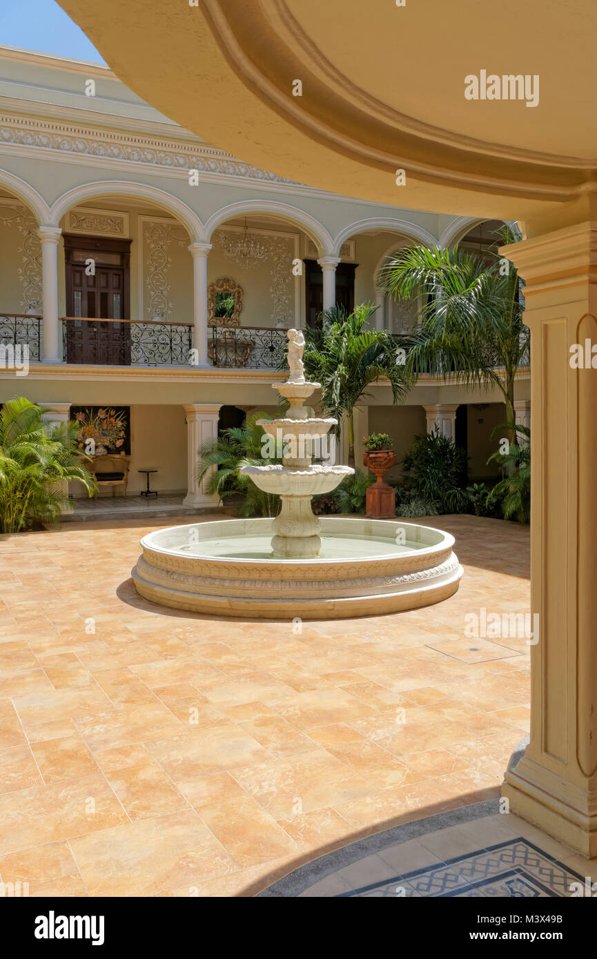 Interior courtyard of the Spanish colonial style Mansion Merida hotel ...