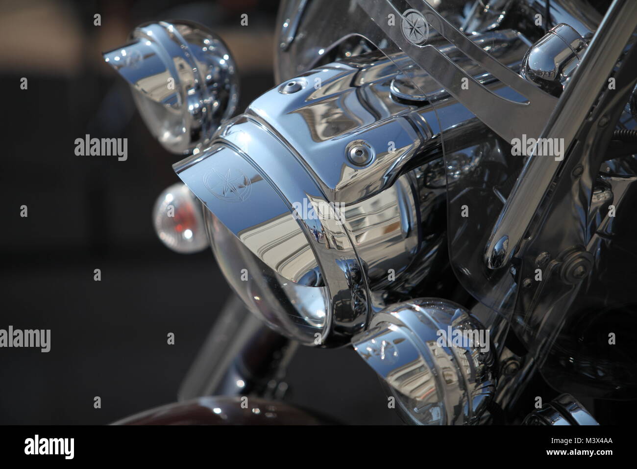 Motorcycle headlights close-up background Stock Photo - Alamy