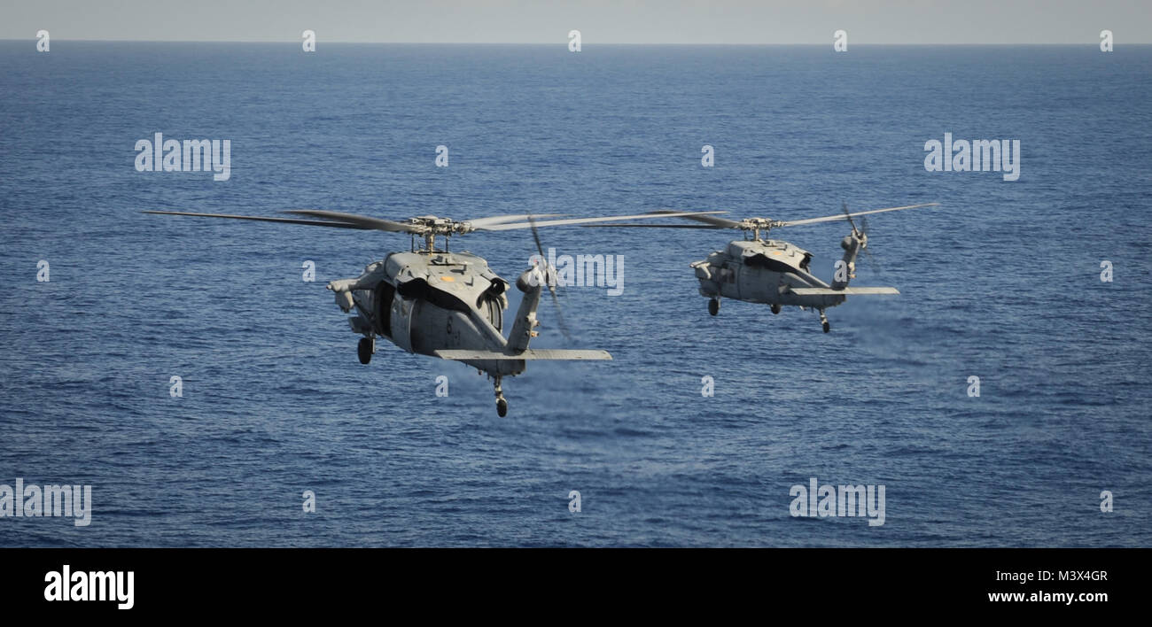 PACIFIC OCEAN (Dec. 2, 2013) MH-60S Seahawk helicopters assigned to the ...