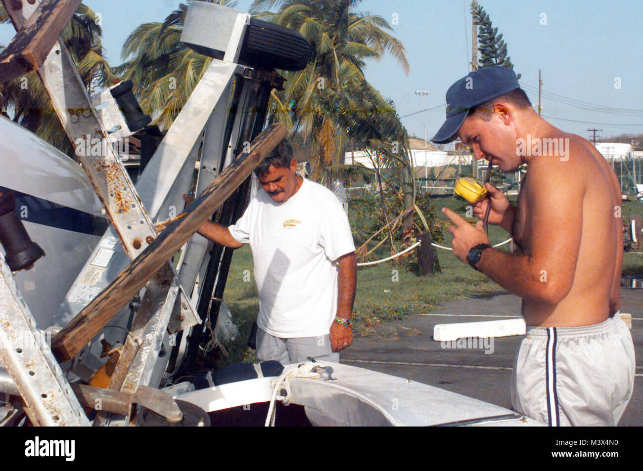 Seamen Richard B. Sleichter, Navy Gunnerman's mate takes a picture of ...