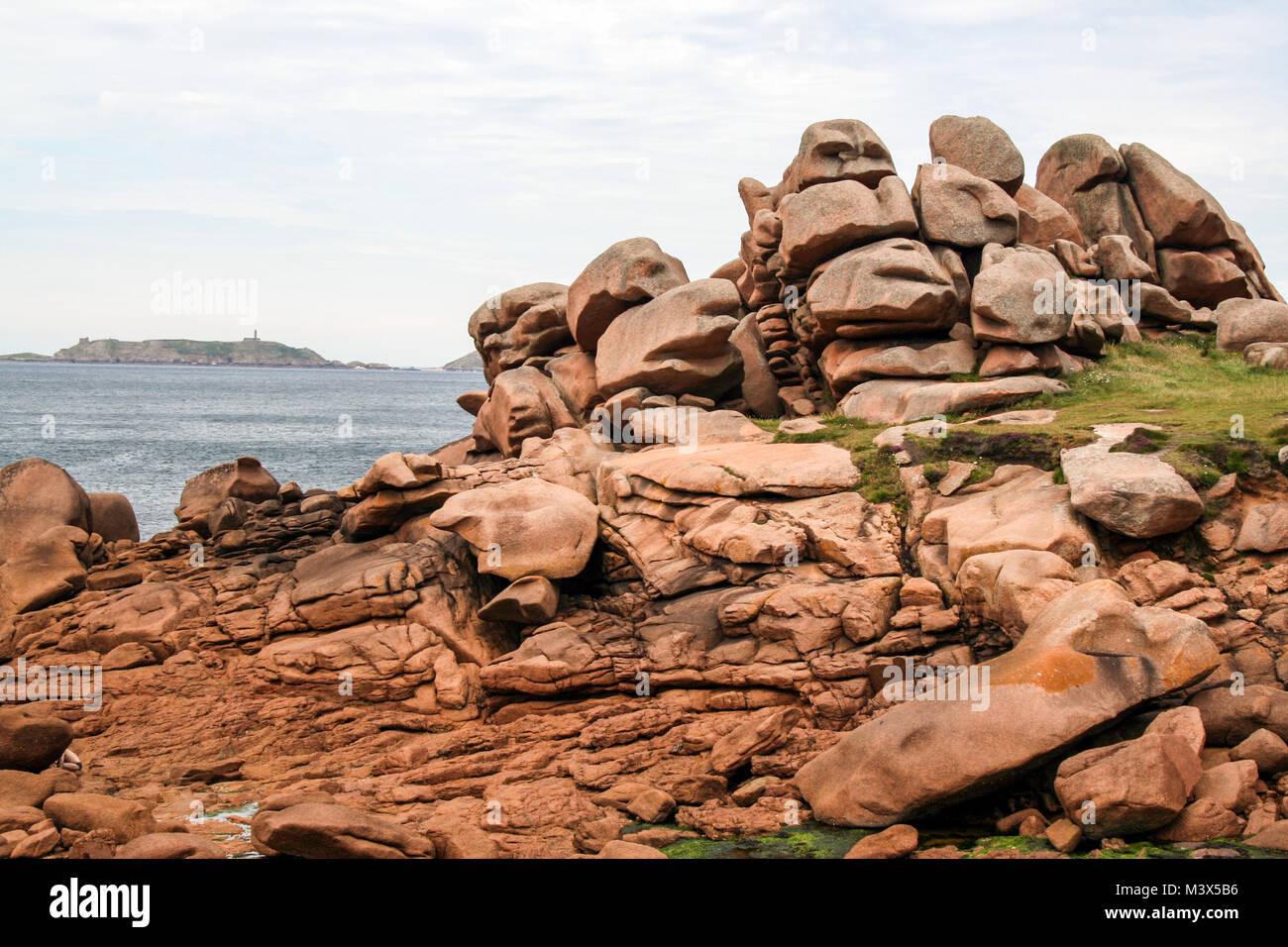 the amazing rocks of pink granite coast in Brittany and suggestive ...