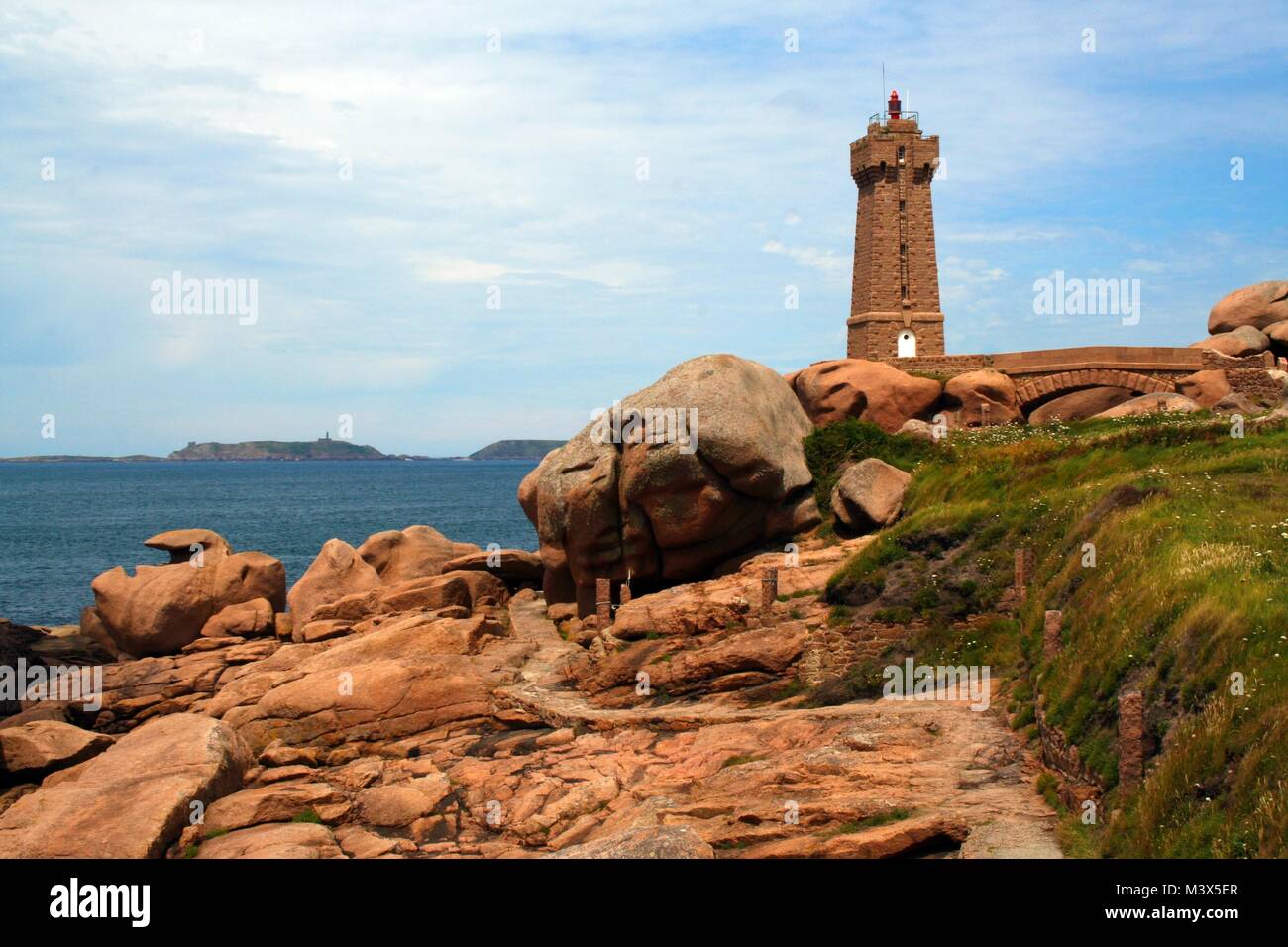 the amazing rocks of pink granite coast in Brittany and suggestive ...