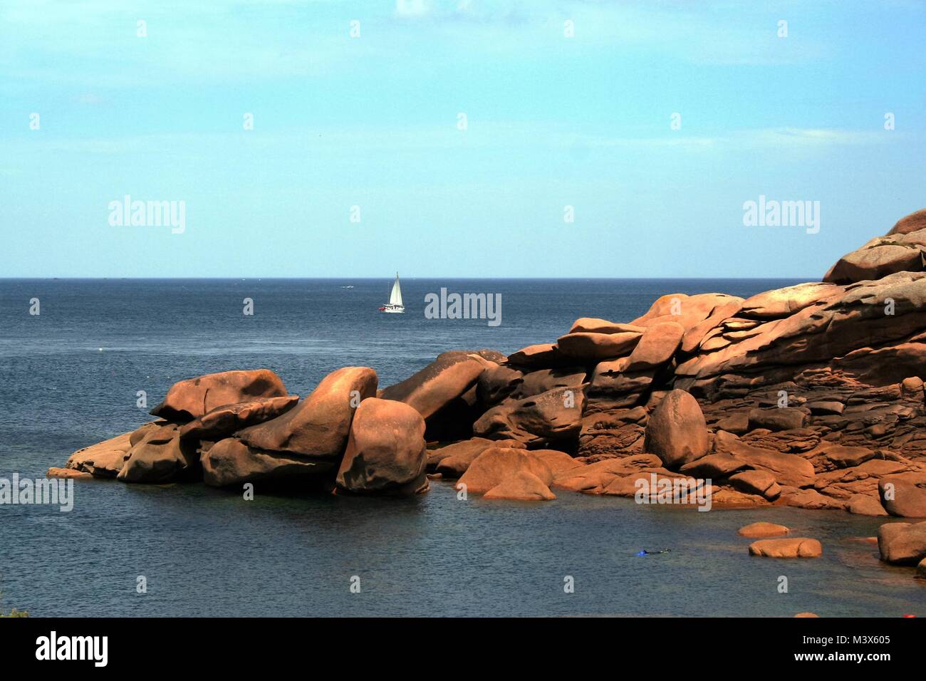 the amazing rocks of pink granite coast in Brittany and suggestive ...