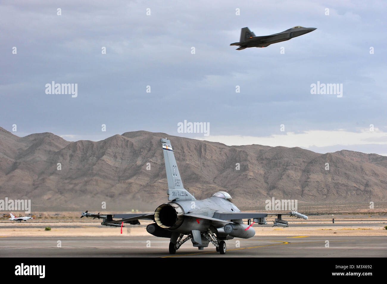 An F-16 Fighting Falcon taxis for a training mission during Red Flag 14 ...