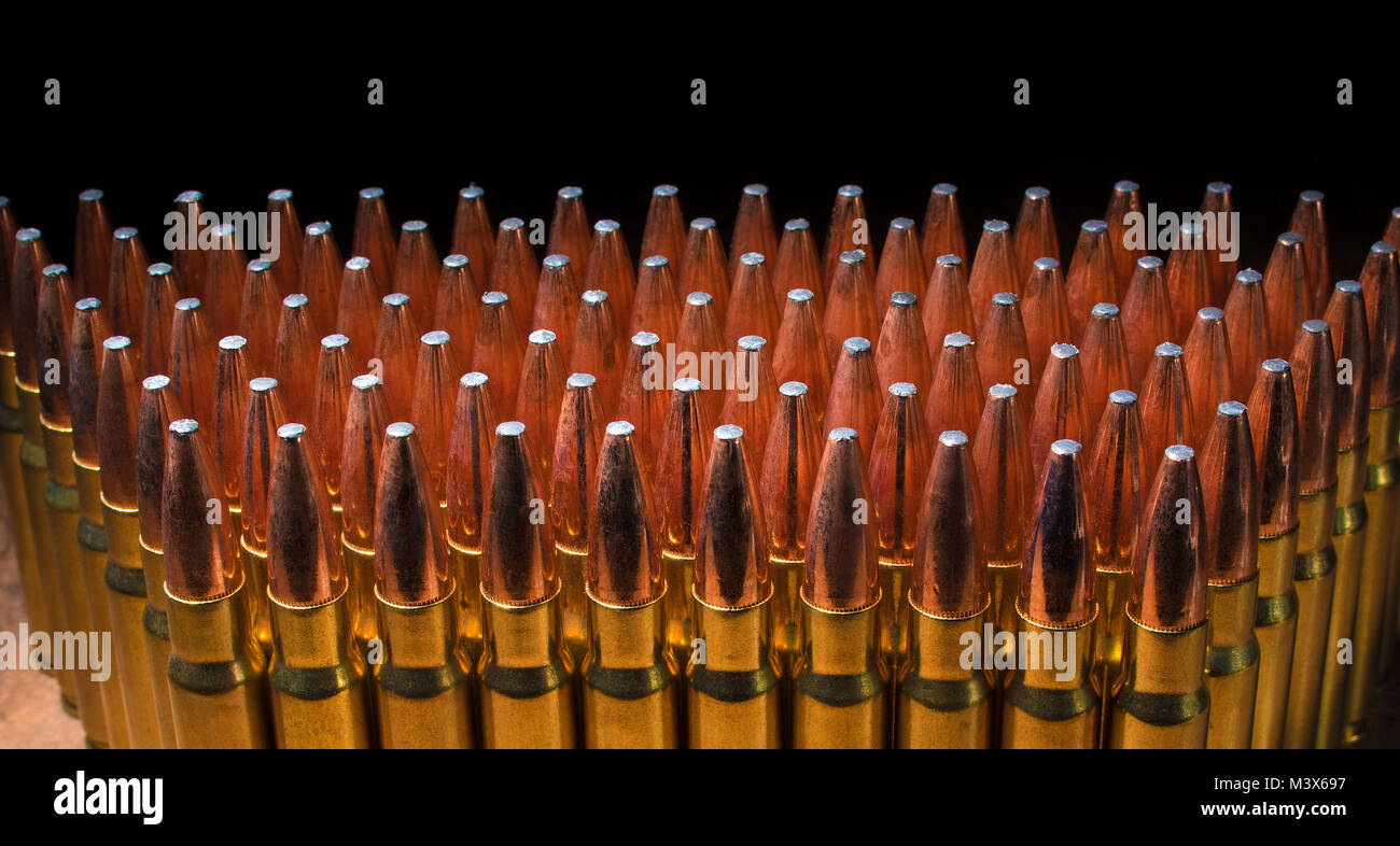 Cartridges used in an AR-10 with copper plated bullets Stock Photo - Alamy