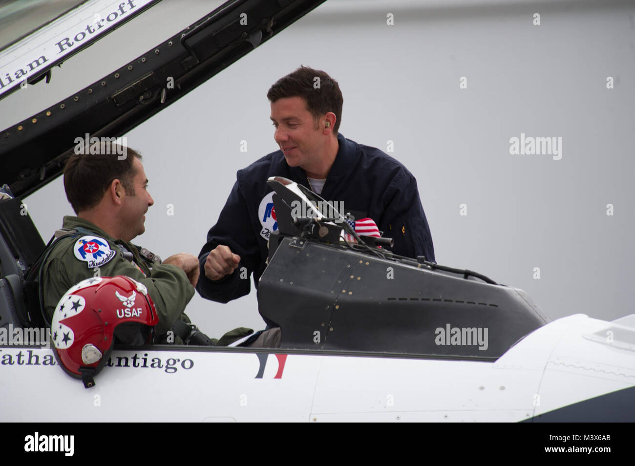 Staff Sgt. Justen Outlaw fist bumps Lt. Col. Greg Moseley prior to ...