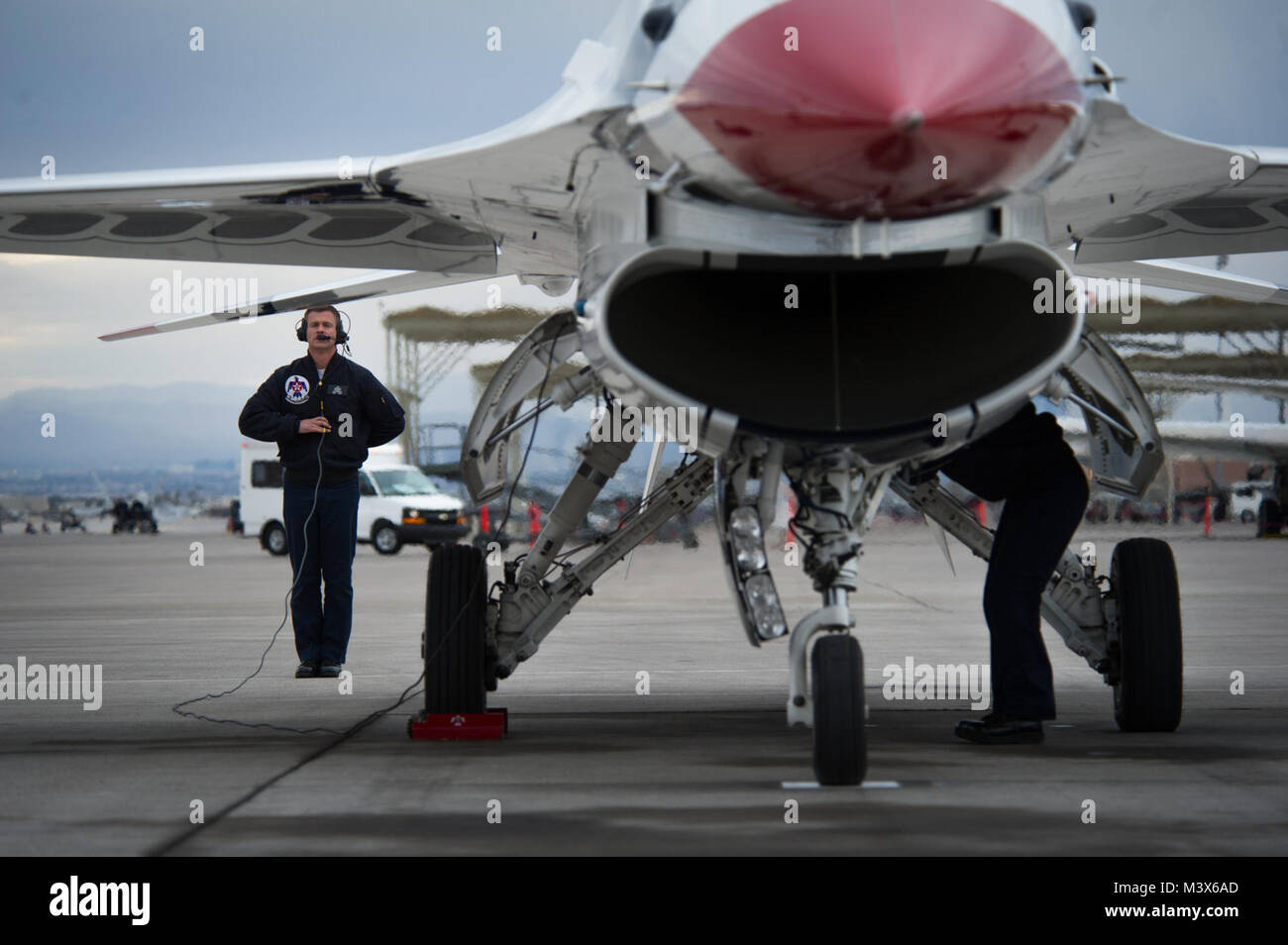 Tech. Sgt. Sean Barrow and Staff Sgt. Jessica Rivers perform preflight ...