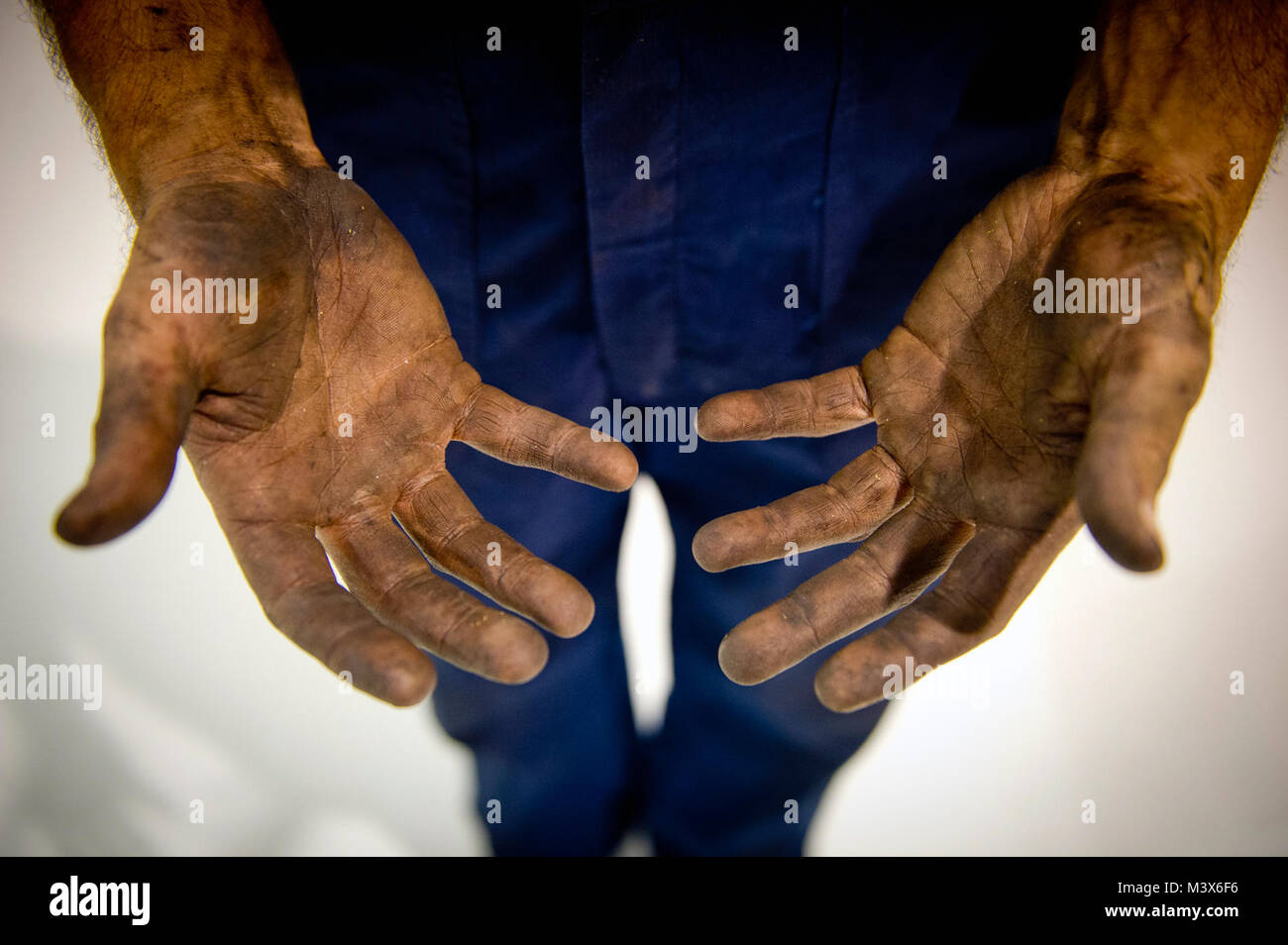 Staff Sgt. Daniel Nightingale shows how messy the job of ensuring the ...