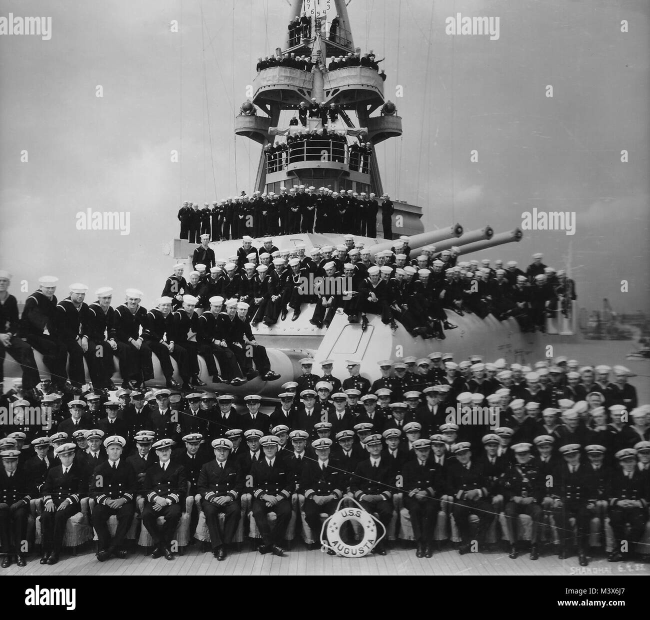 Chester Nimitz (front row, center), officers and crew of the USS ...