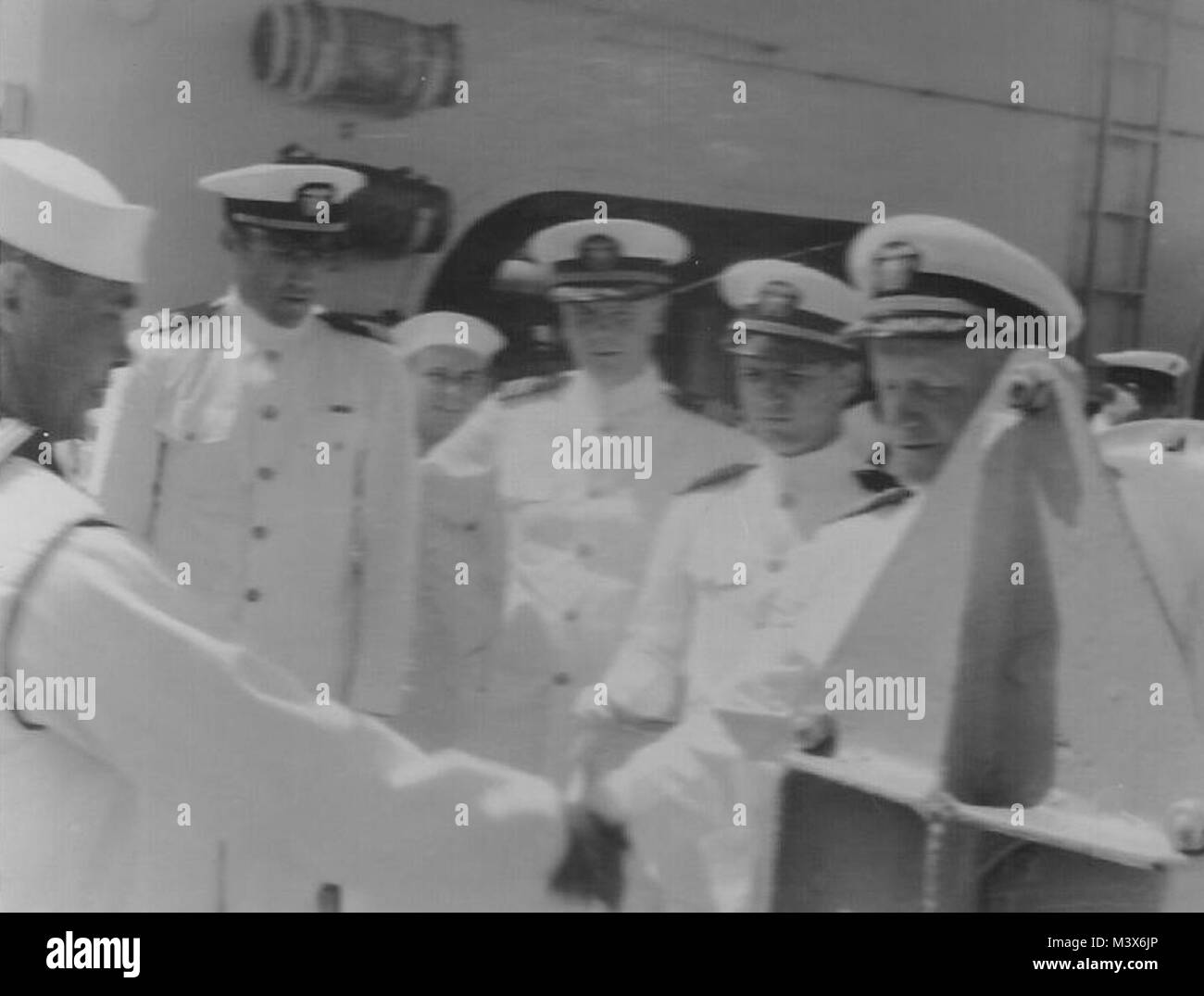 Chester Nimitz shakes hands with a Sailor. From the private collection ...