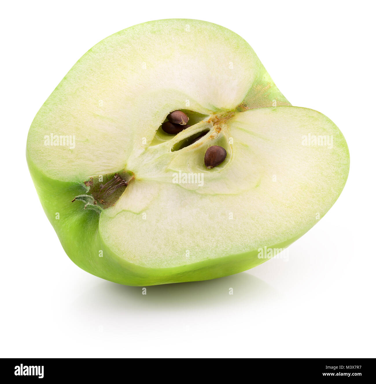 half of green apple isolated on a white background Stock Photo - Alamy