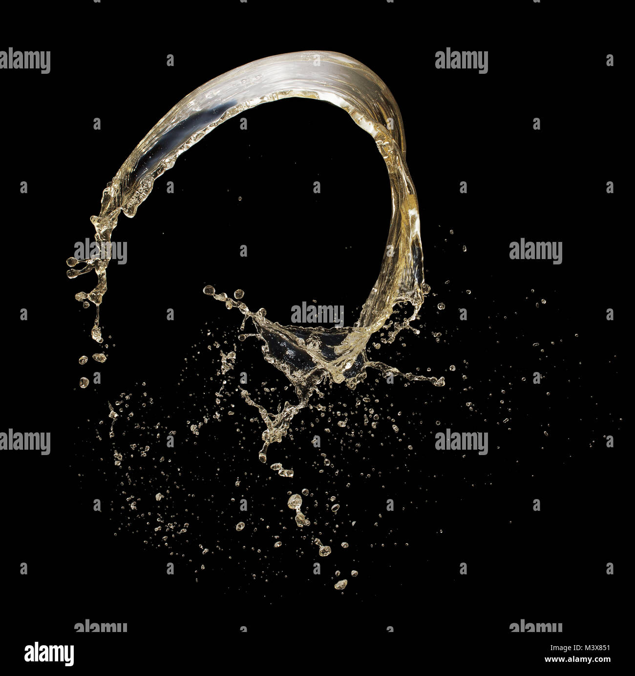 champagne splash on a black background Stock Photo - Alamy