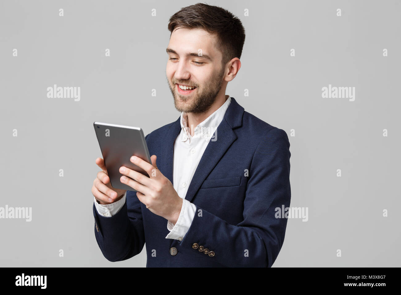 Business Concept - Portrait Handsome Business man playing digital ...