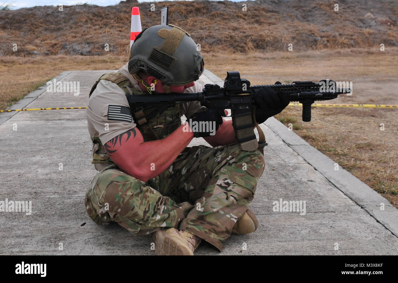 A member of the Special Operations Team from the United States takes ...