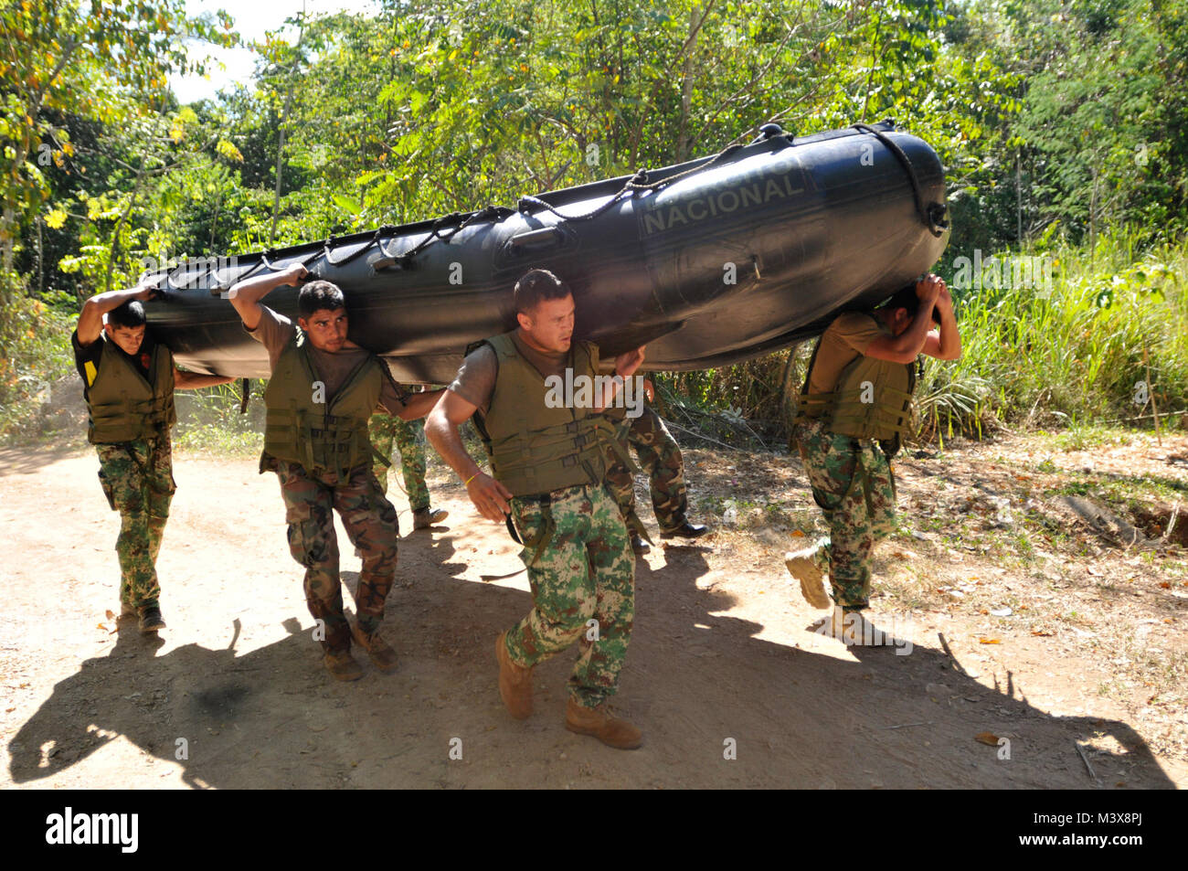 Members of the Paraguay Special Operations team carry a raft from the ...