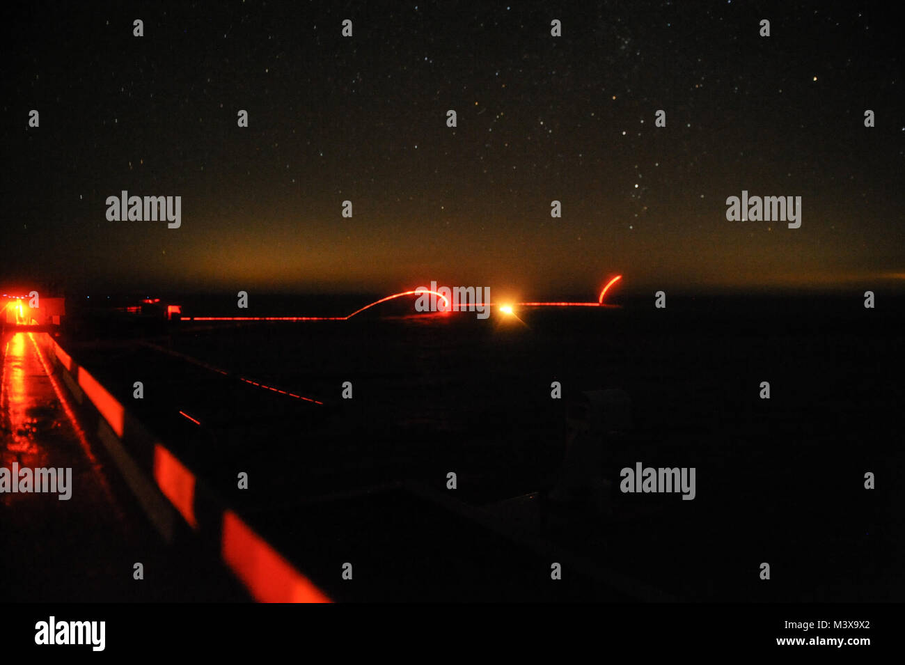 PACIFIC OCEAN (Sept. 17, 2014) Tracer rounds from a .50-caliber machine ...