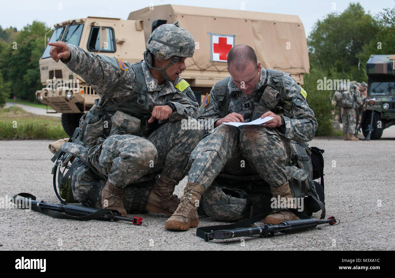 PFC Christopher Clark (left) and Capt. Brian Thorson (right), members ...