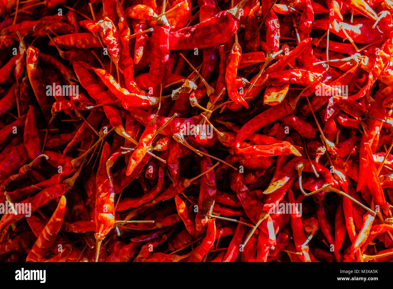 Chili, packed in bamboo baskets, is for sale at the vegetable market in ...
