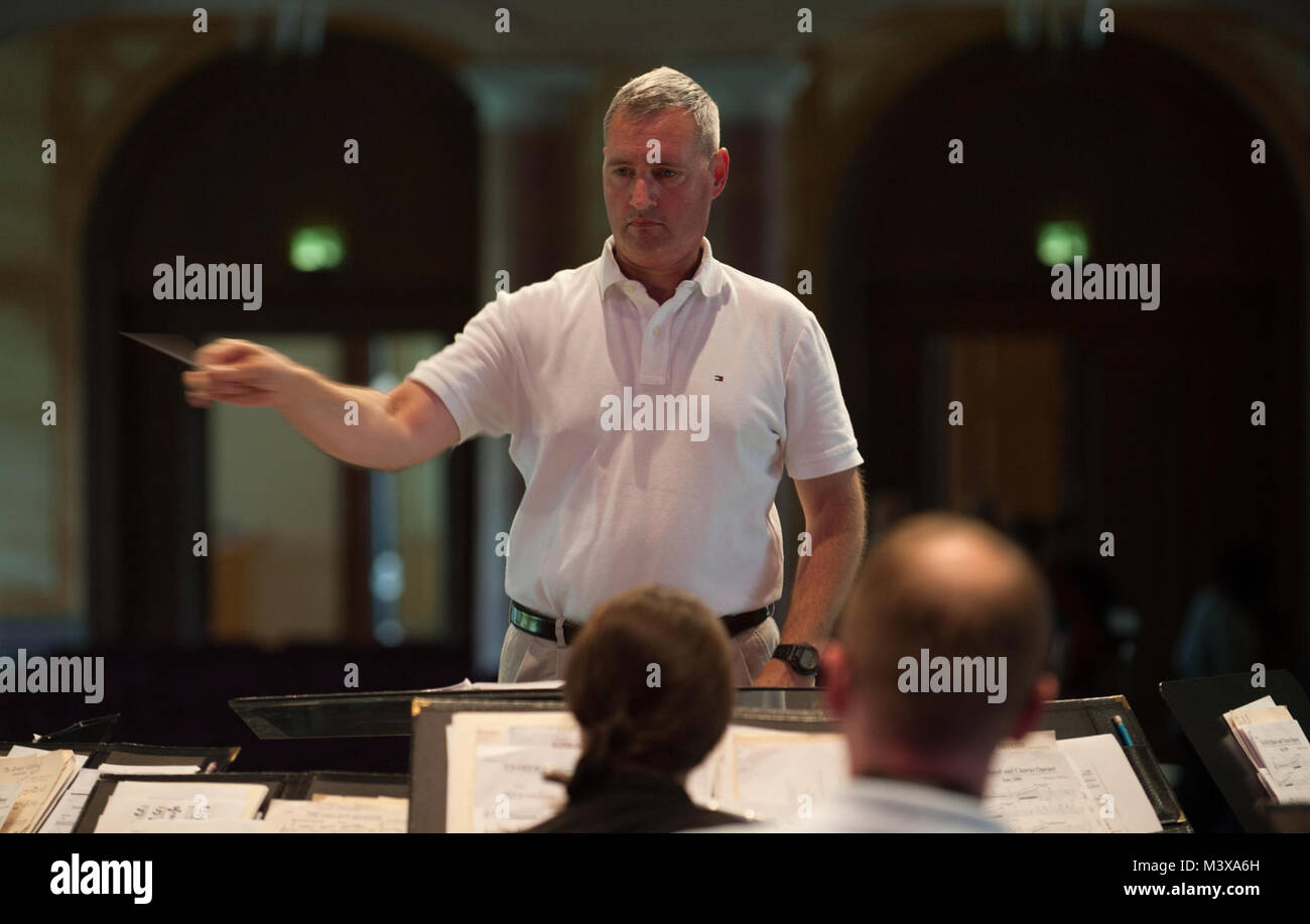 Lieutenant Colonel Bruce Pulver, the commander and conductor for the ...