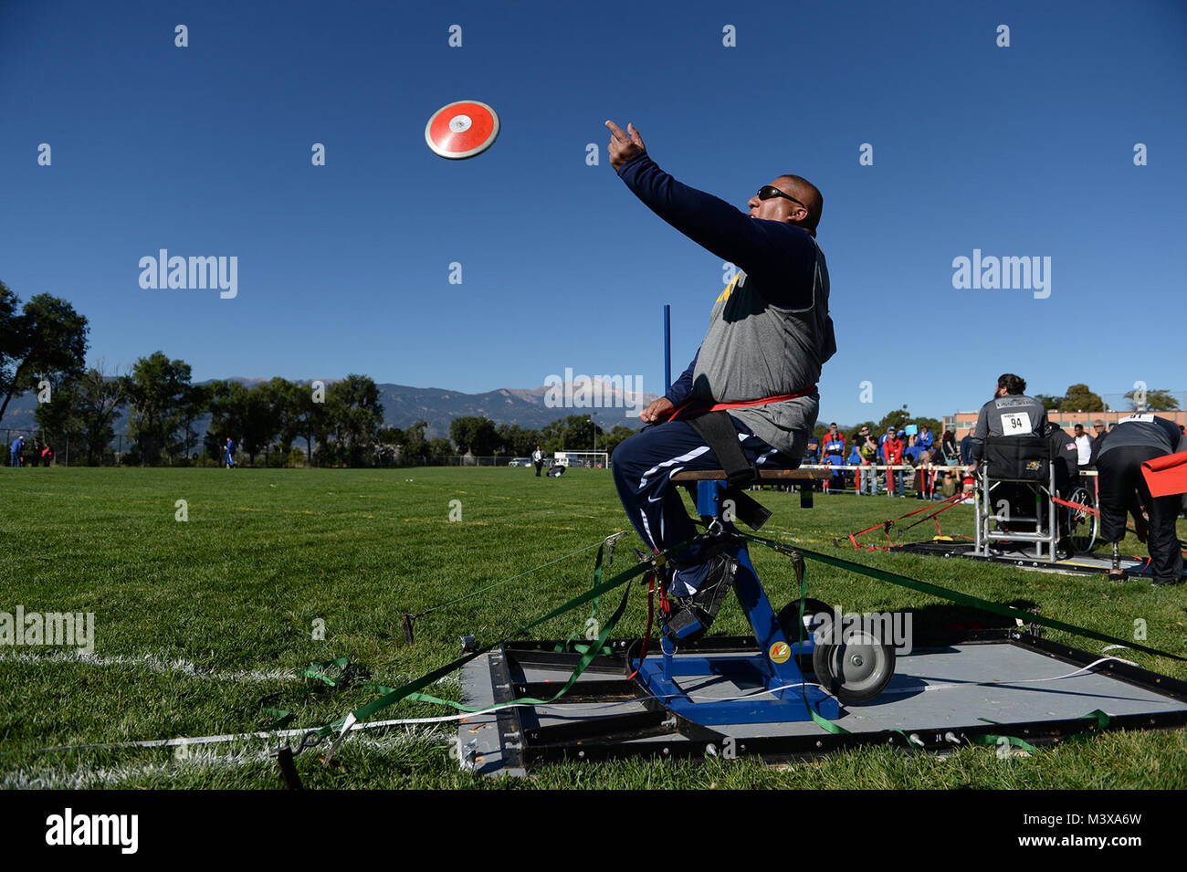 Navy team’s retired Petty Officer 1st Class Jim Castaneda throws the ...