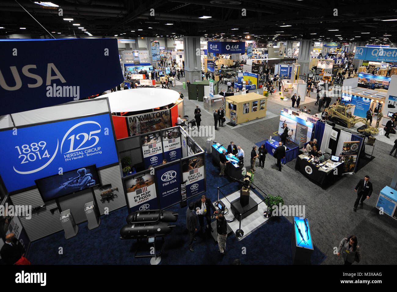 The Department of Defense community visits booths in Exhibit Hall ...