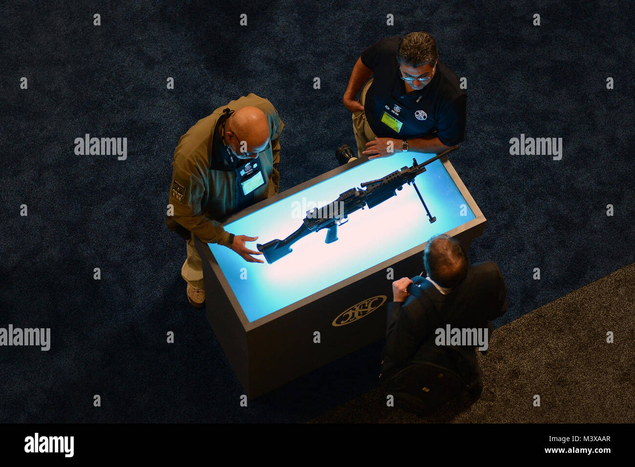 The Department of Defense community visits booths in Exhibit Hall ...