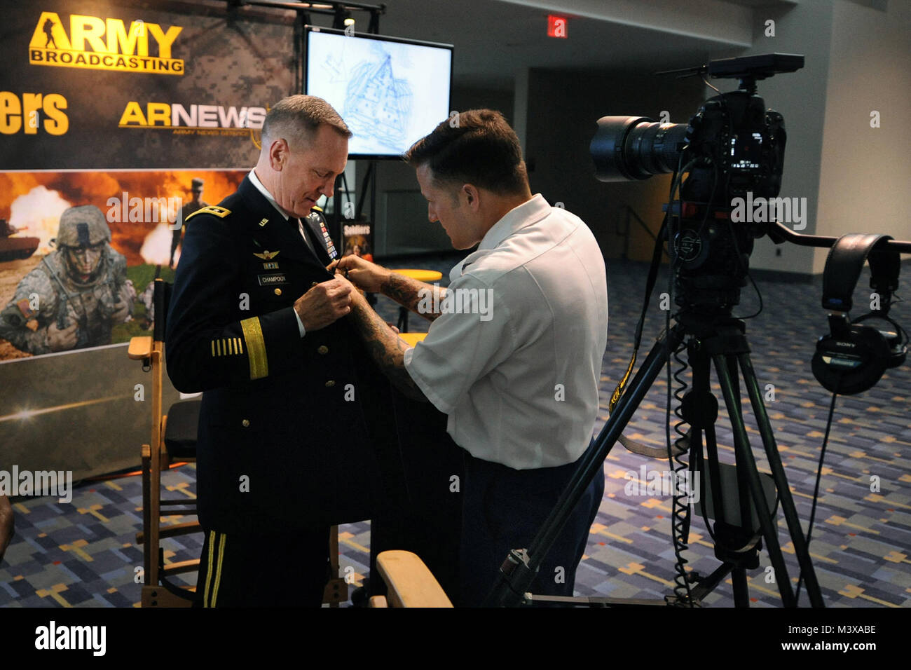 Prior to conducting an interview, Spc. Andrew Vidakovich, a Defense ...