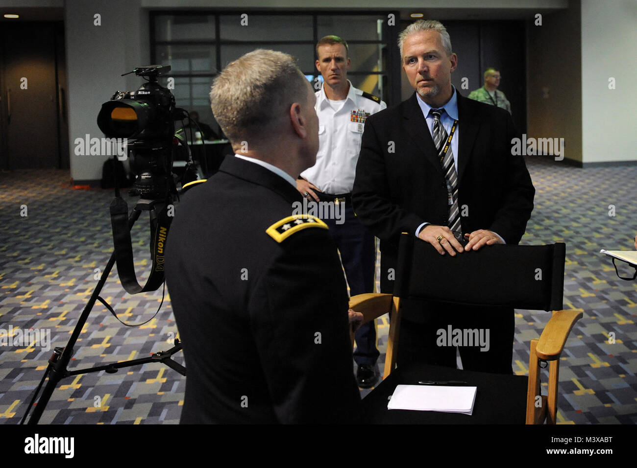 Mr. Mike Burnette, Chief Army Broadcasting, converses with Lt. Gen ...