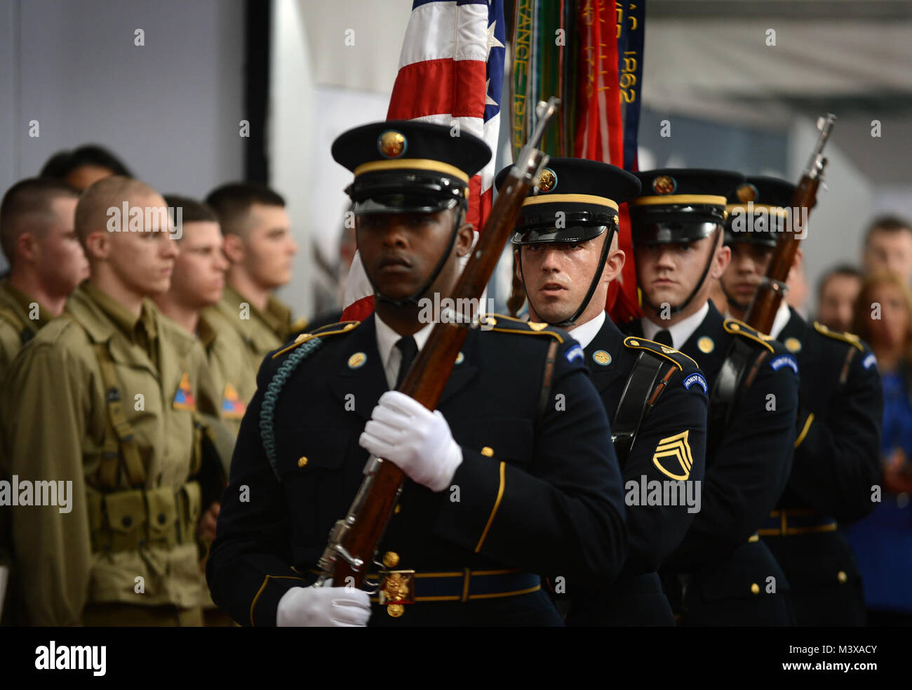 Members of the Honor Guard post the "Colors" as Retired, active duty ...