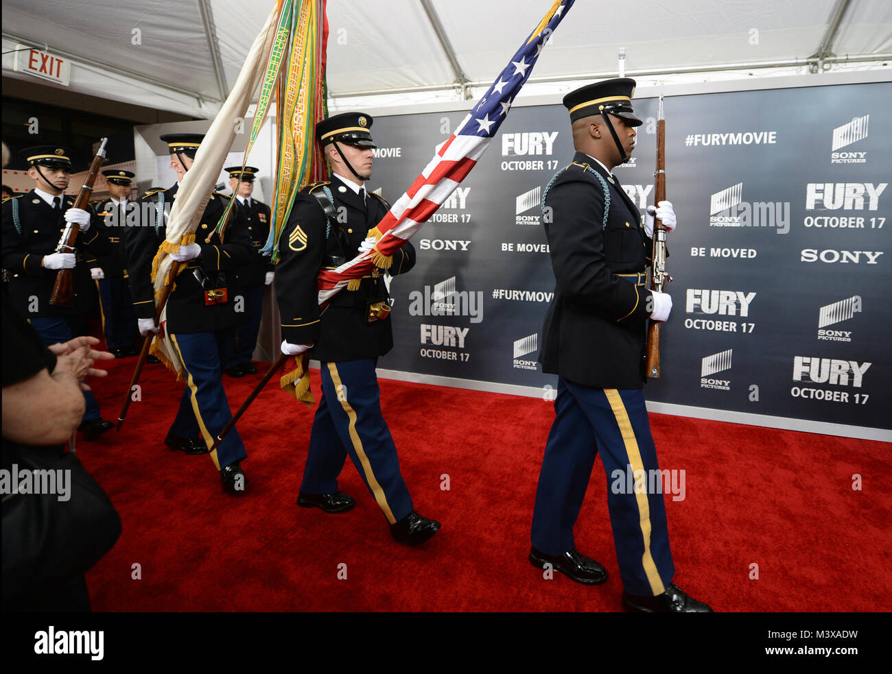 Members of the Honor Guard post the "Colors" as Retired, active duty ...