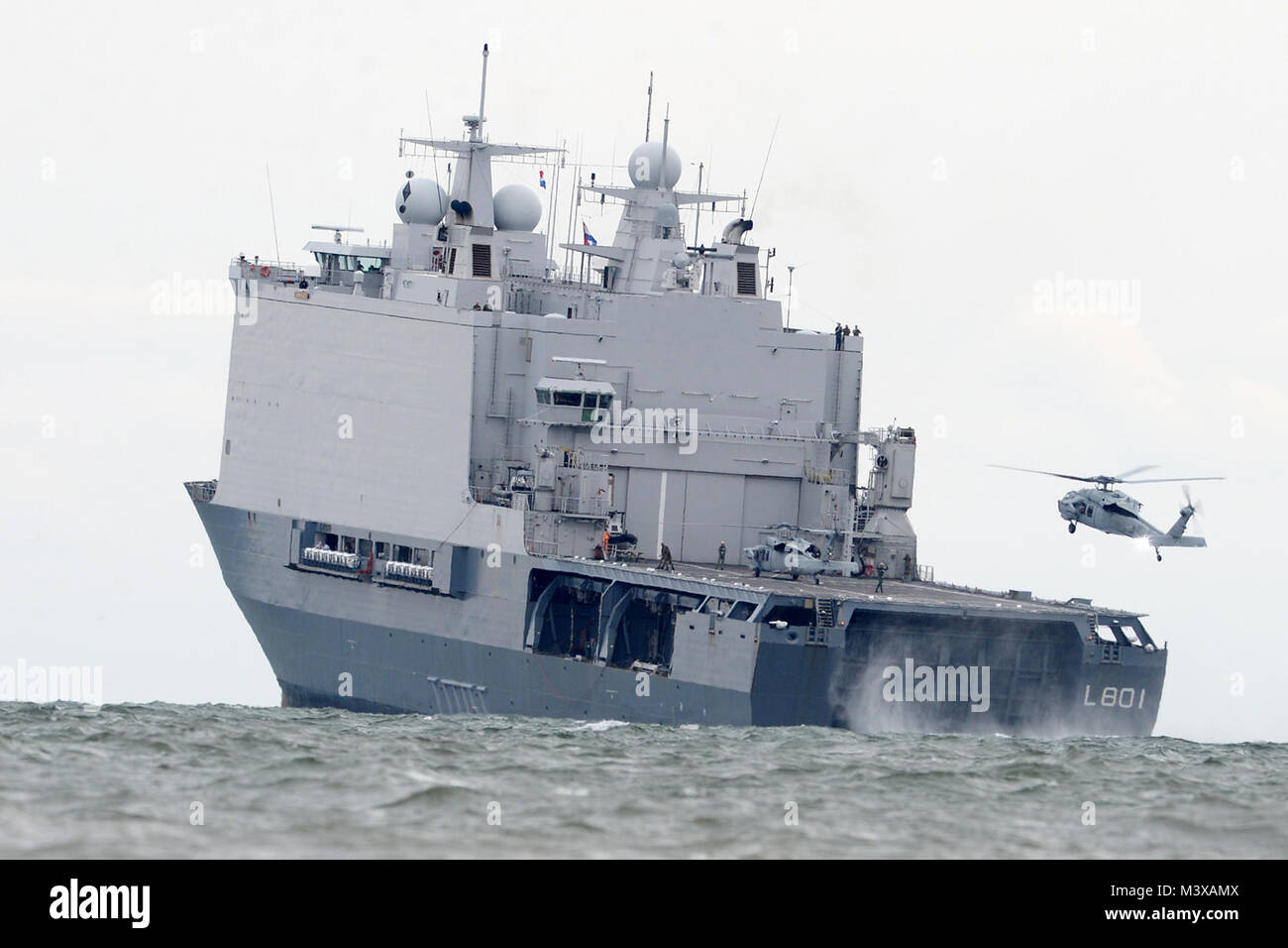 A U.S. Navy Seahawk helicopter lands on the Royal Netherlands Navy ...