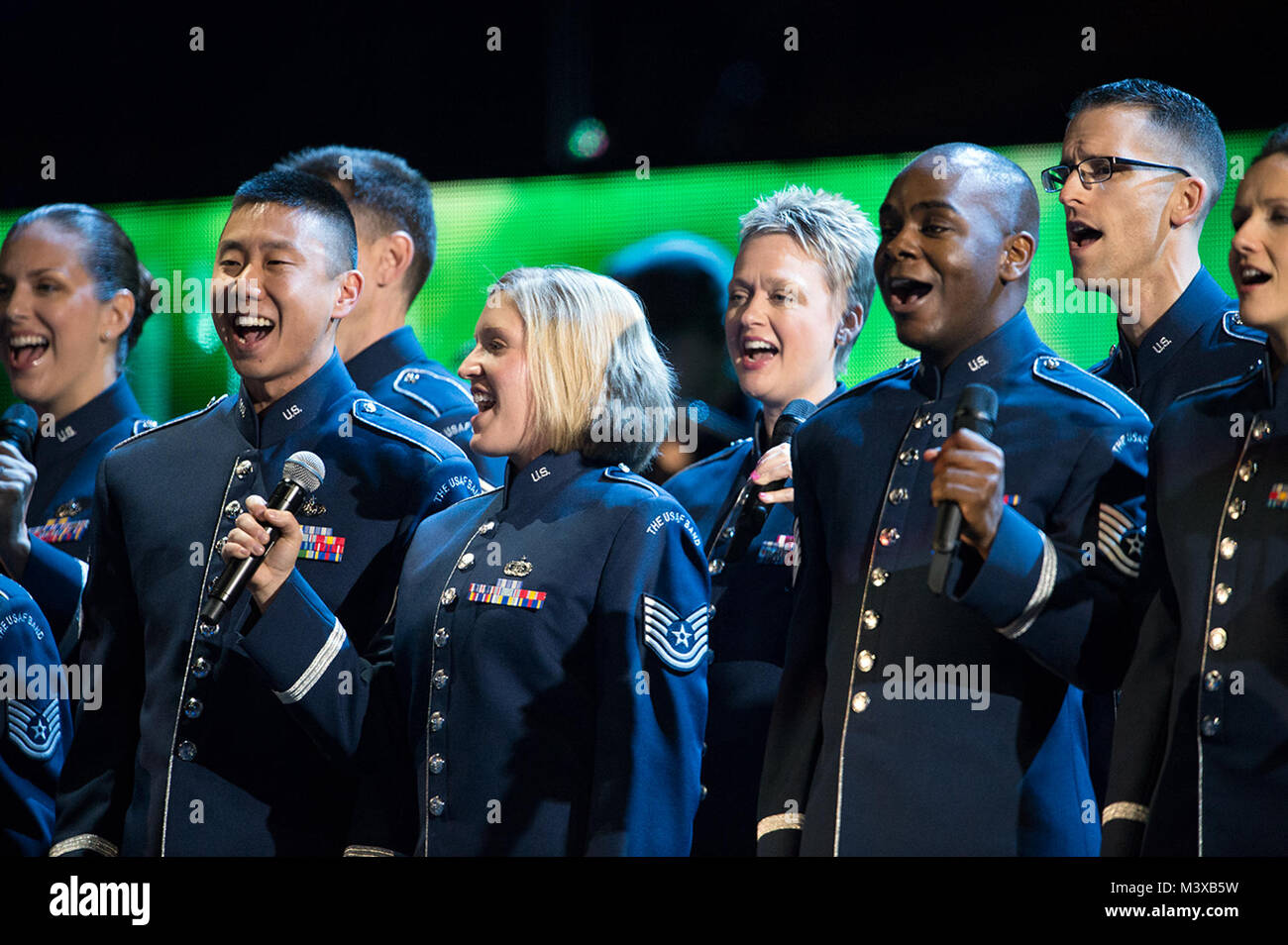 The Air Force Singing Sergeants sing chorus for Carrie Underwood during ...