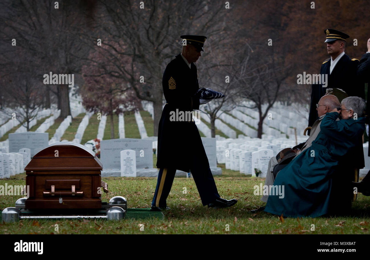 Sgt. Major Michael Callaghan-Mccann prepares to present the U.S. flag ...