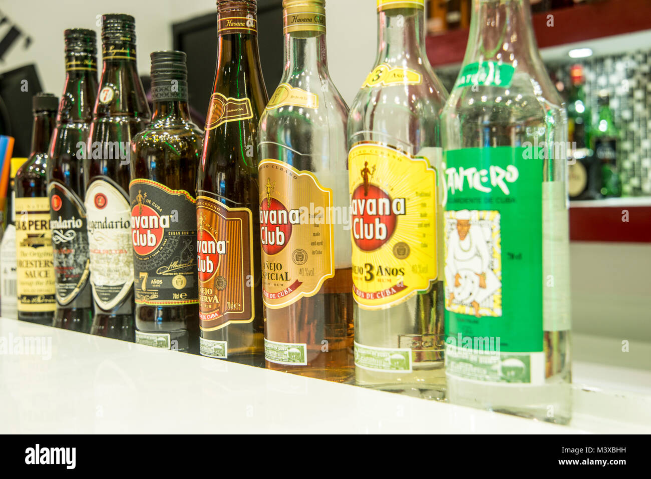 Several bottles of Cuban rum on display in bar of Old Havana Stock ...