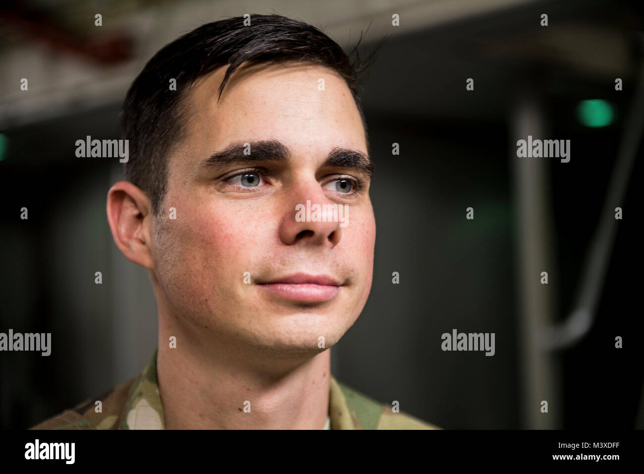 A U.S. Air Force C-17 Globemaster III flying crew chief, assigned to ...